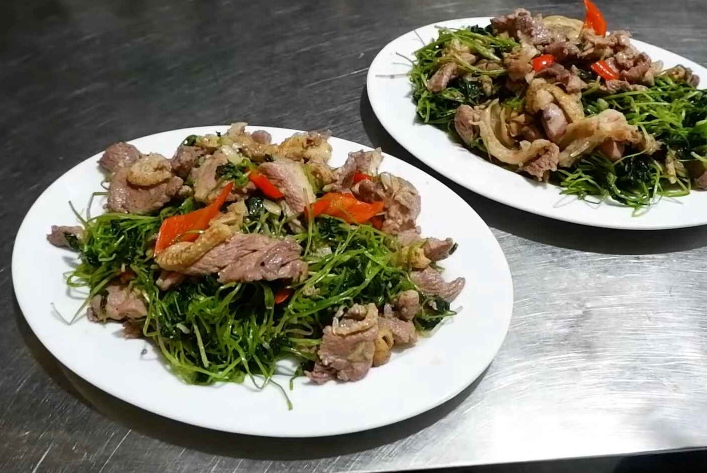 Thử ngay cách làm vịt xào rau má đổi gió cho cuối tuần này